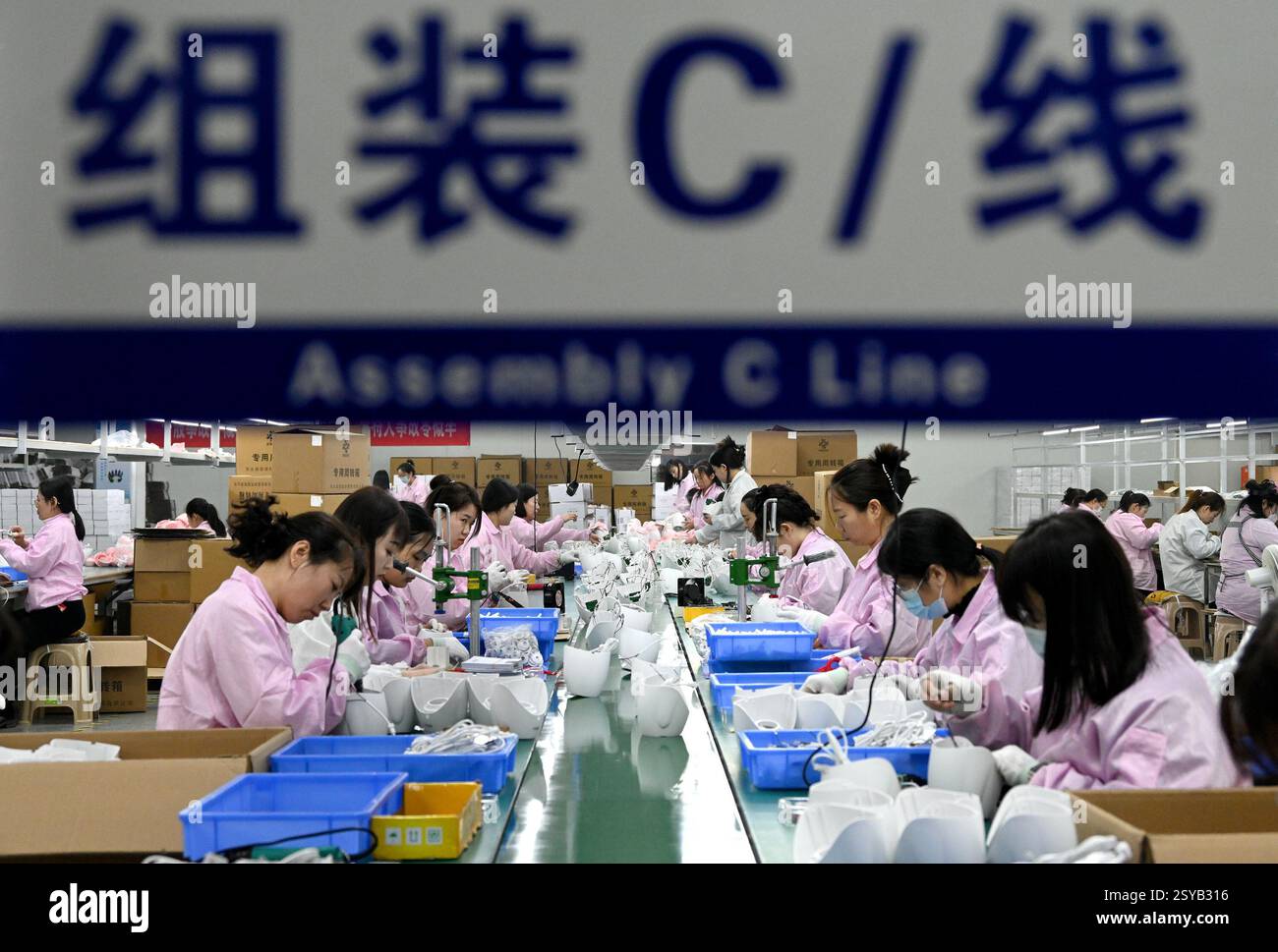 HANDAN, CHINA - FEBRUARY 28, 2025 - Workers work on a production line ...