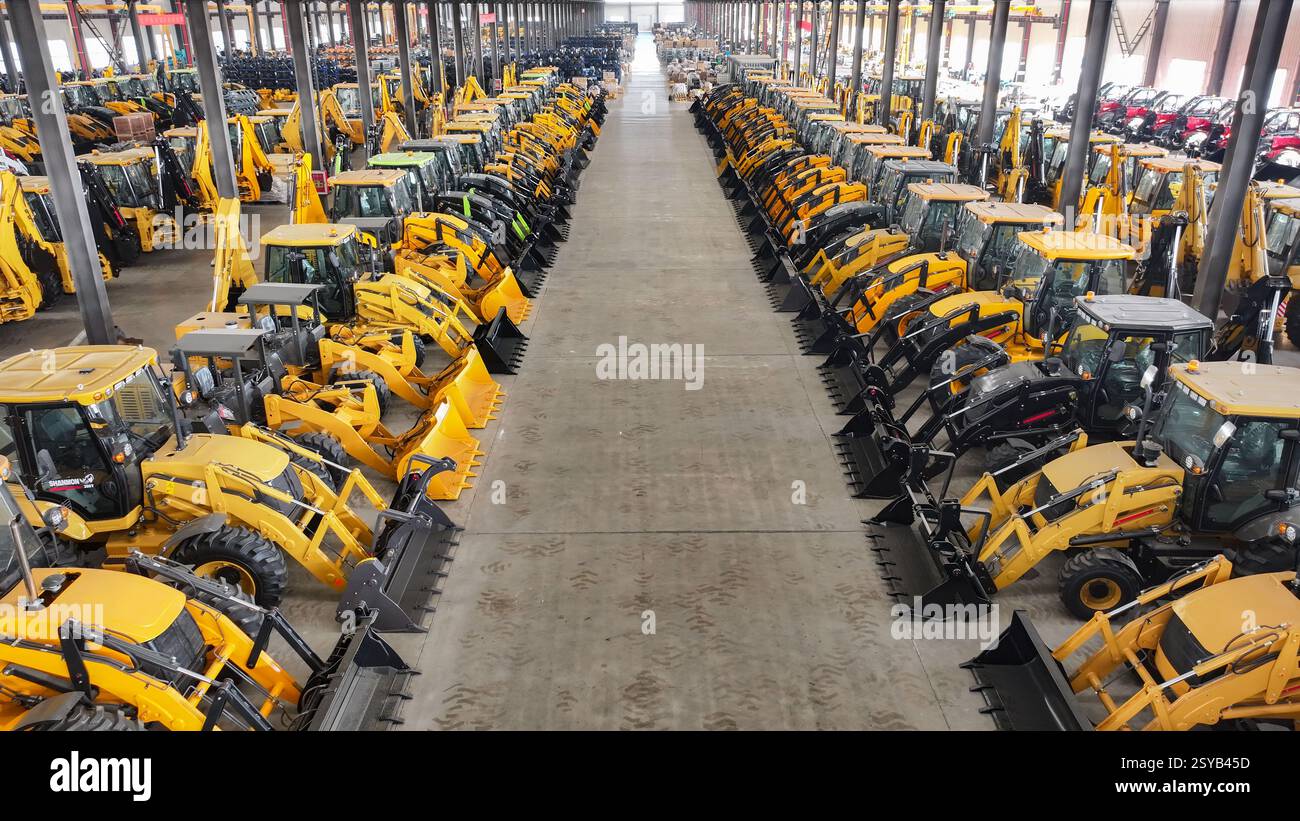 Products waiting to be shipped are arranged in a workshop of a loader ...