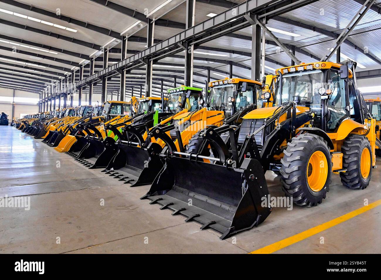 Products waiting to be shipped are arranged in a workshop of a loader ...