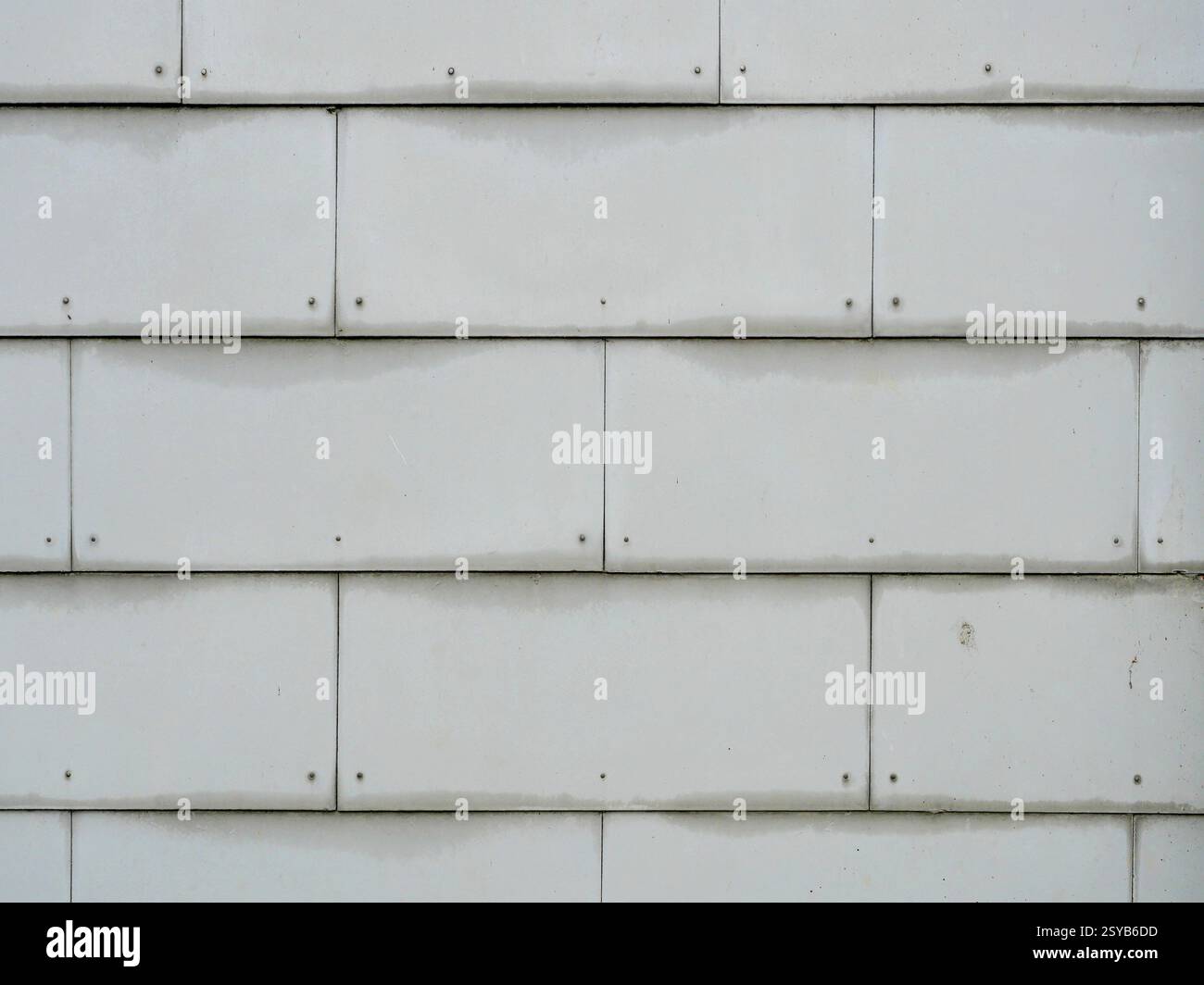 Gray fiber cement shingles as facade cladding. Ideal for textures ...