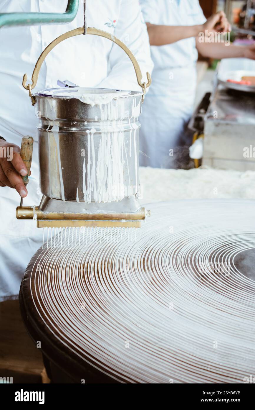 The making of Turkish desert Kadayif pastry in display Stock Photo - Alamy