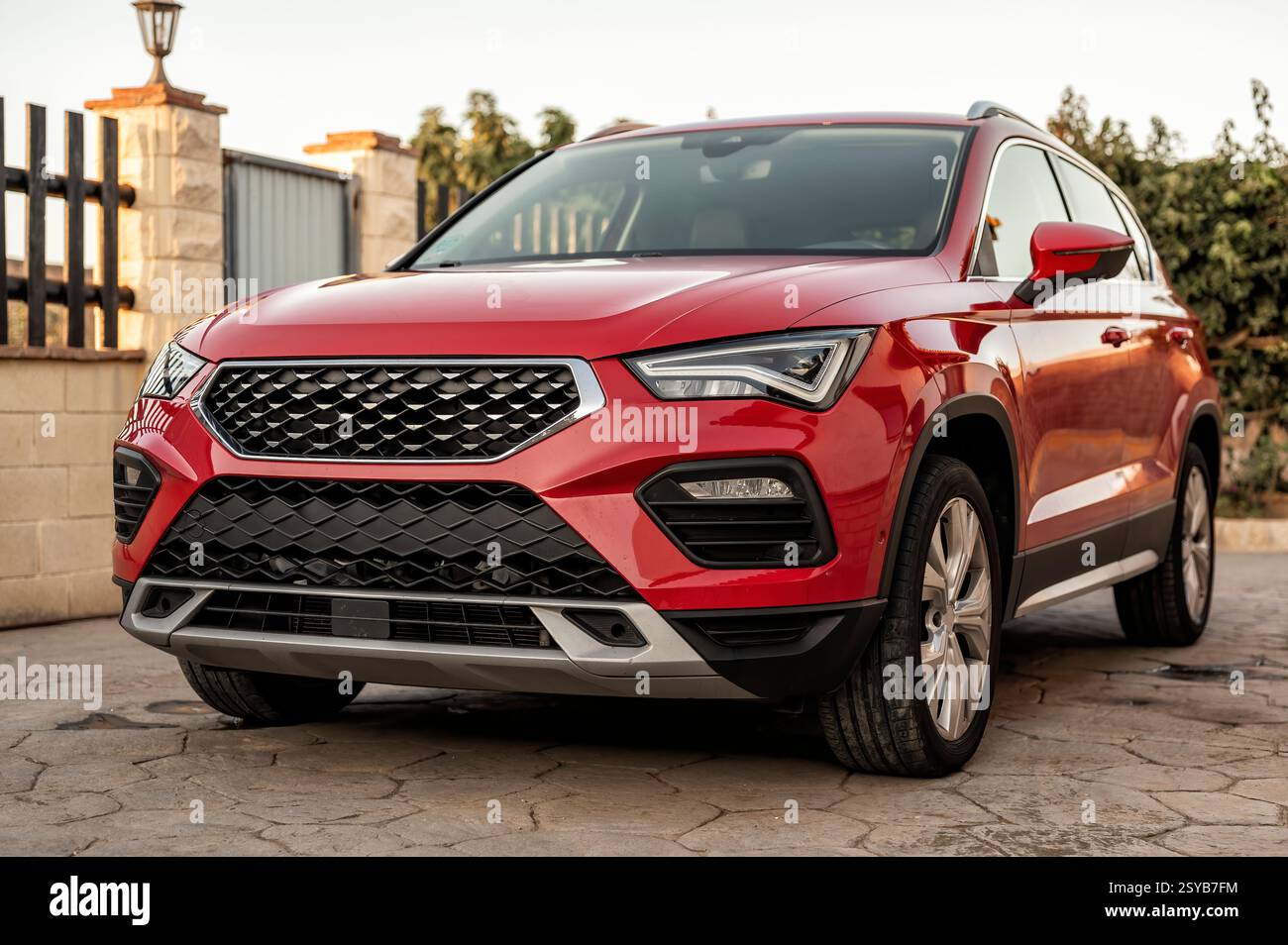 Front view of a red standard SUV with no visible brand symbols or ...