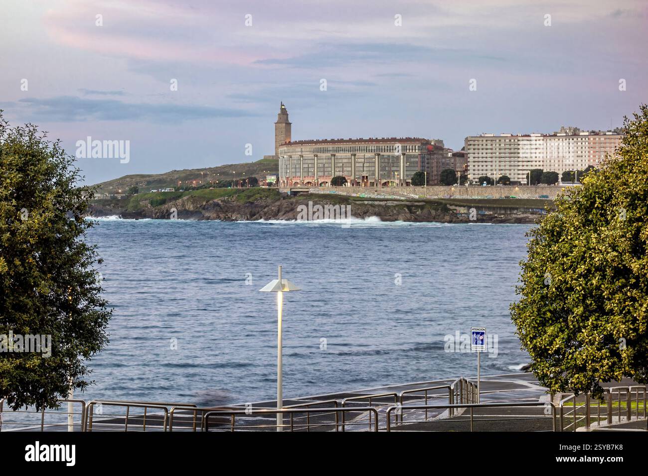 Riazor beach bay in the Spanish city of A Coruña and the Hercules tower ...