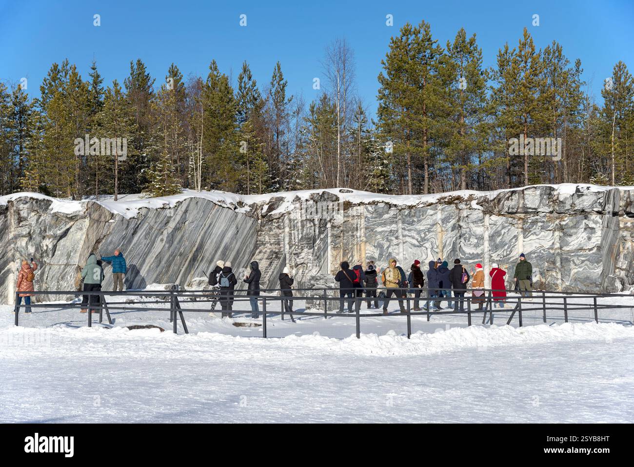 RUSKEALA, RUSSIA - FEBRUARY 20, 2025: Excursion group in the Italian ...