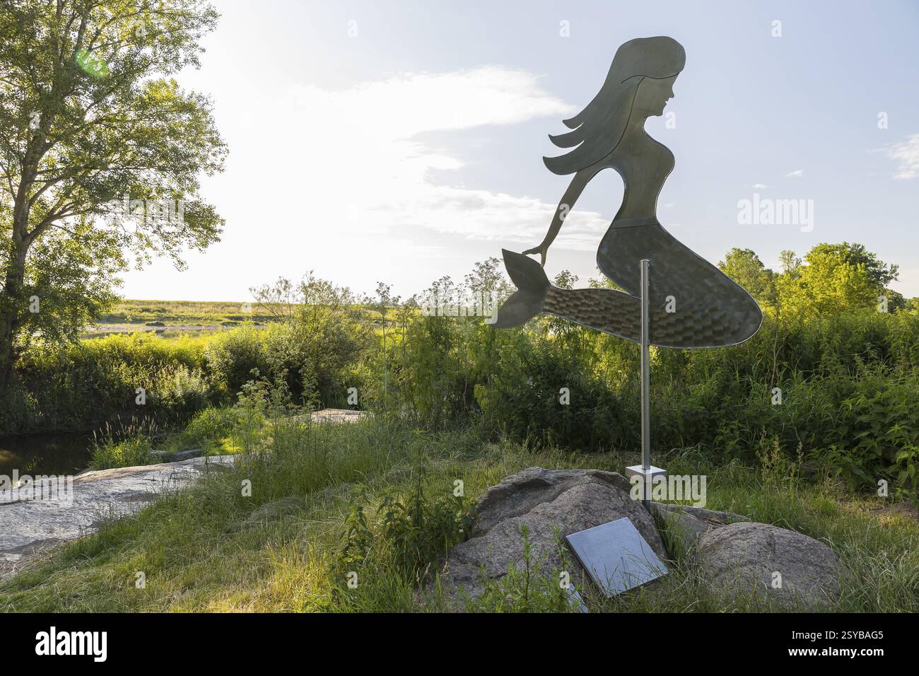 Figure of a mermaid and remains of the old mermaid stone in the dead ...
