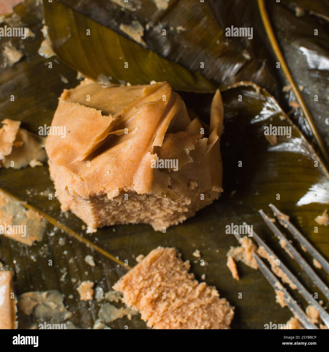 Overhead of moi moi in leaf on a plate, top view of nigerian bean ...