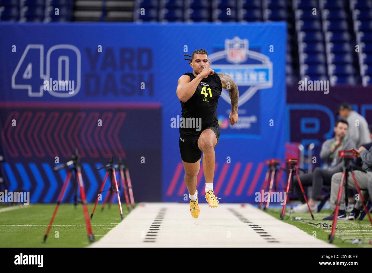 Miami defensive lineman Tyler Baron runs the 40-yard dash at the NFL ...