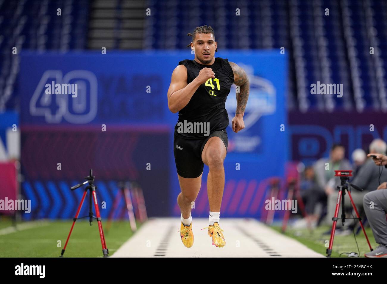 Miami defensive lineman Tyler Baron runs the 40-yard dash at the NFL ...