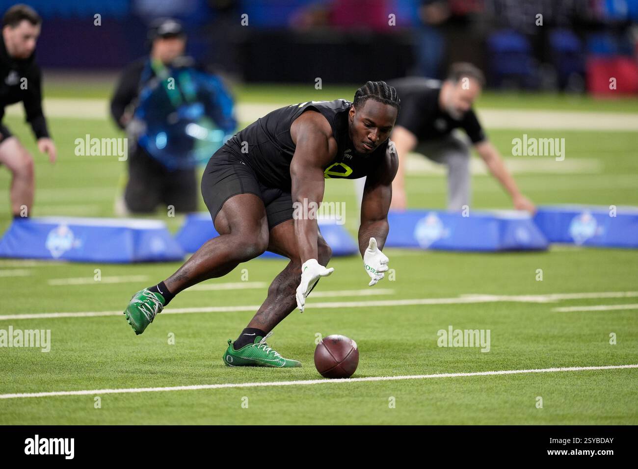 Oregon linebacker Jeffrey Bassa runs a drill at the NFL football ...