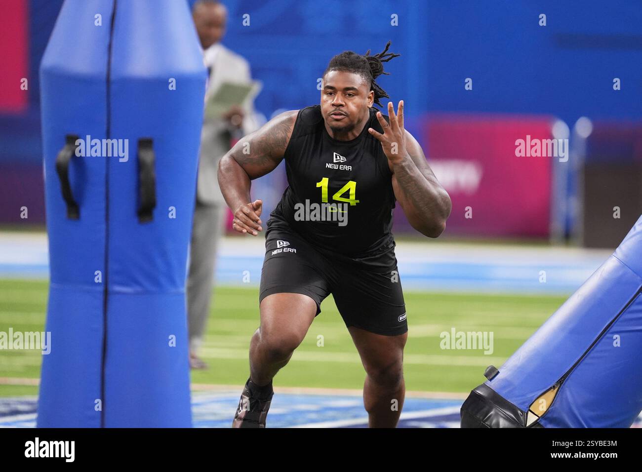 Ohio State defensive lineman Ty Hamilton runs a drill at the NFL ...