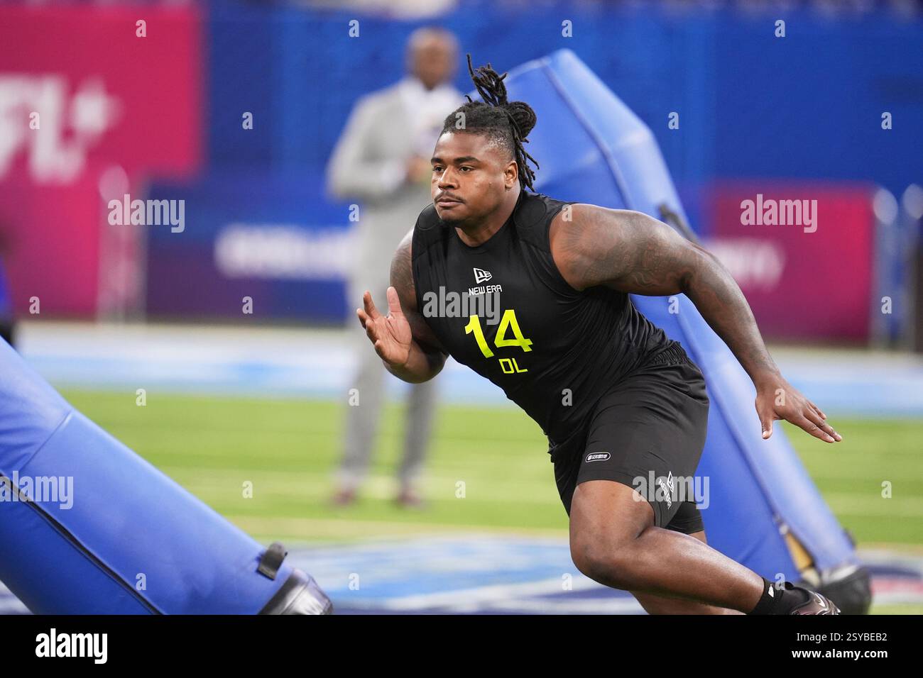 Ohio State defensive lineman Ty Hamilton runs a drill at the NFL ...