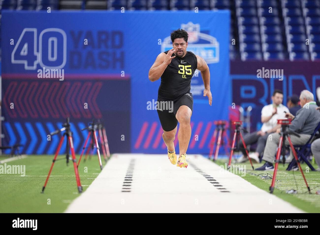 Utah defensive lineman Junior Tafuna runs the 40-yard dash at the NFL ...