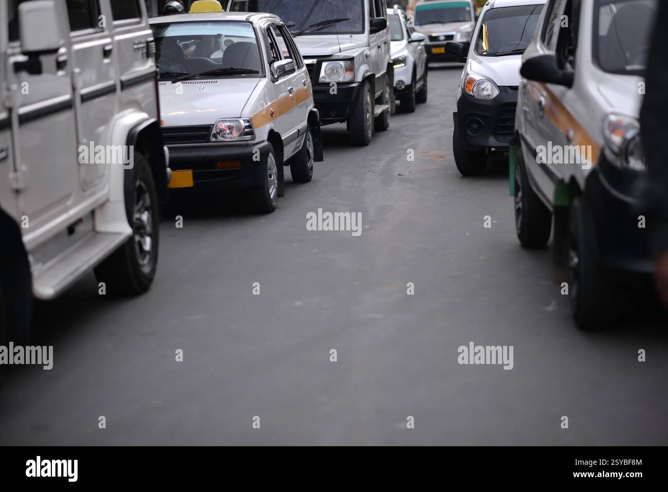 A city traffic scene with taxis in line in Mizoram, India Stock Photo ...