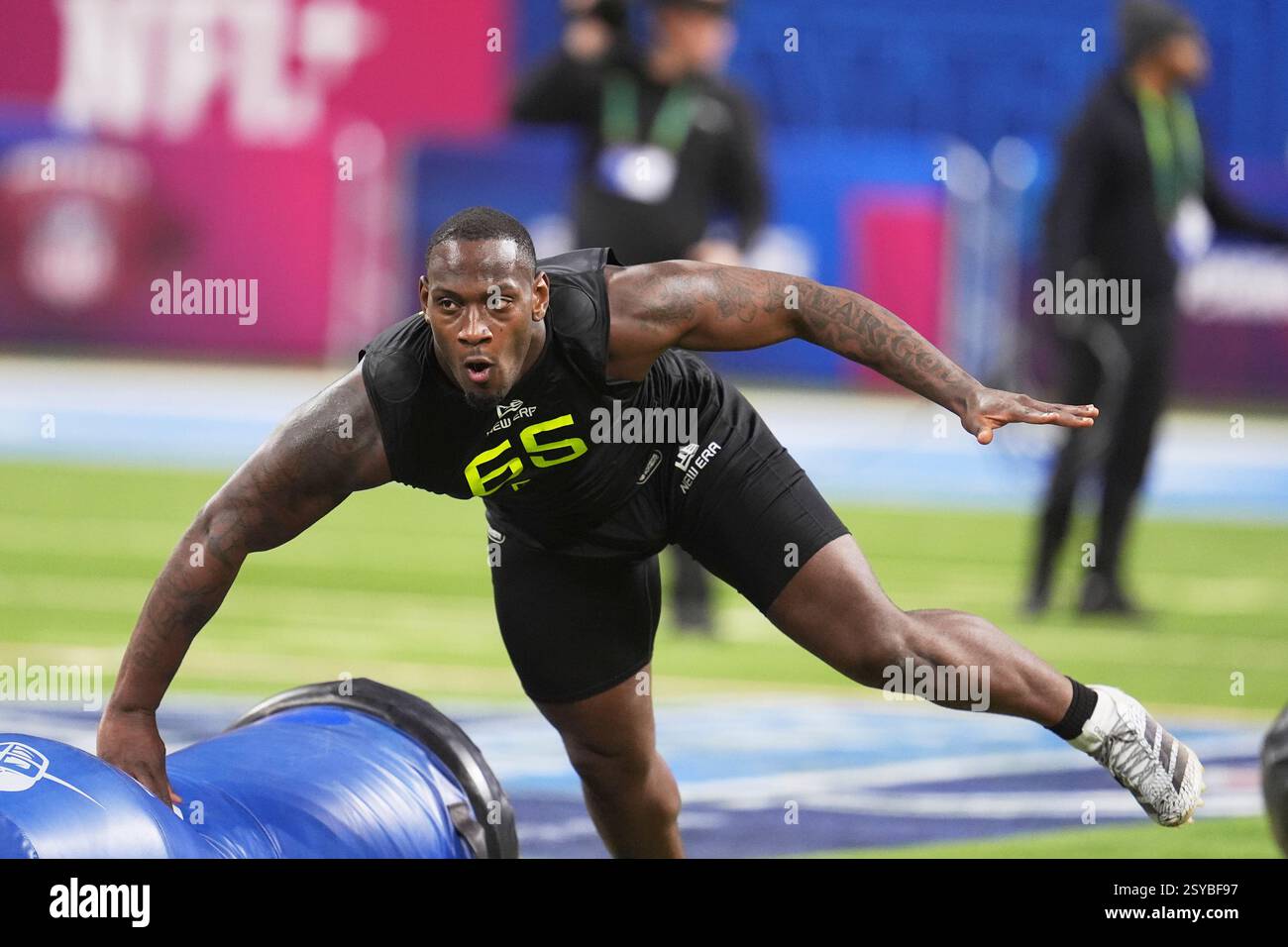 Texas A&M defensive lineman Nic Scourton runs a drill at the NFL ...