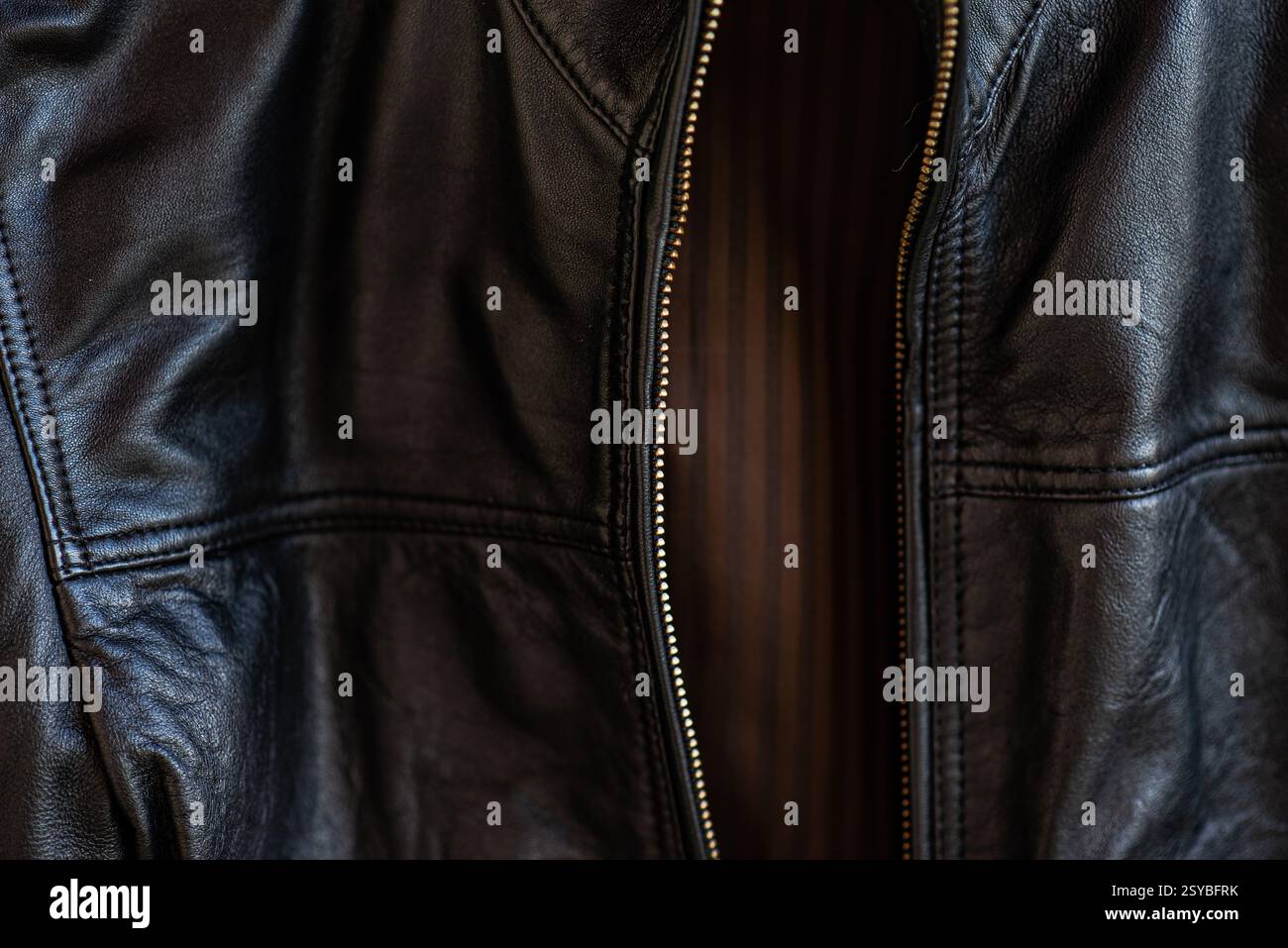 Close up photo of a black leather jacket with steel zippers Stock Photo ...