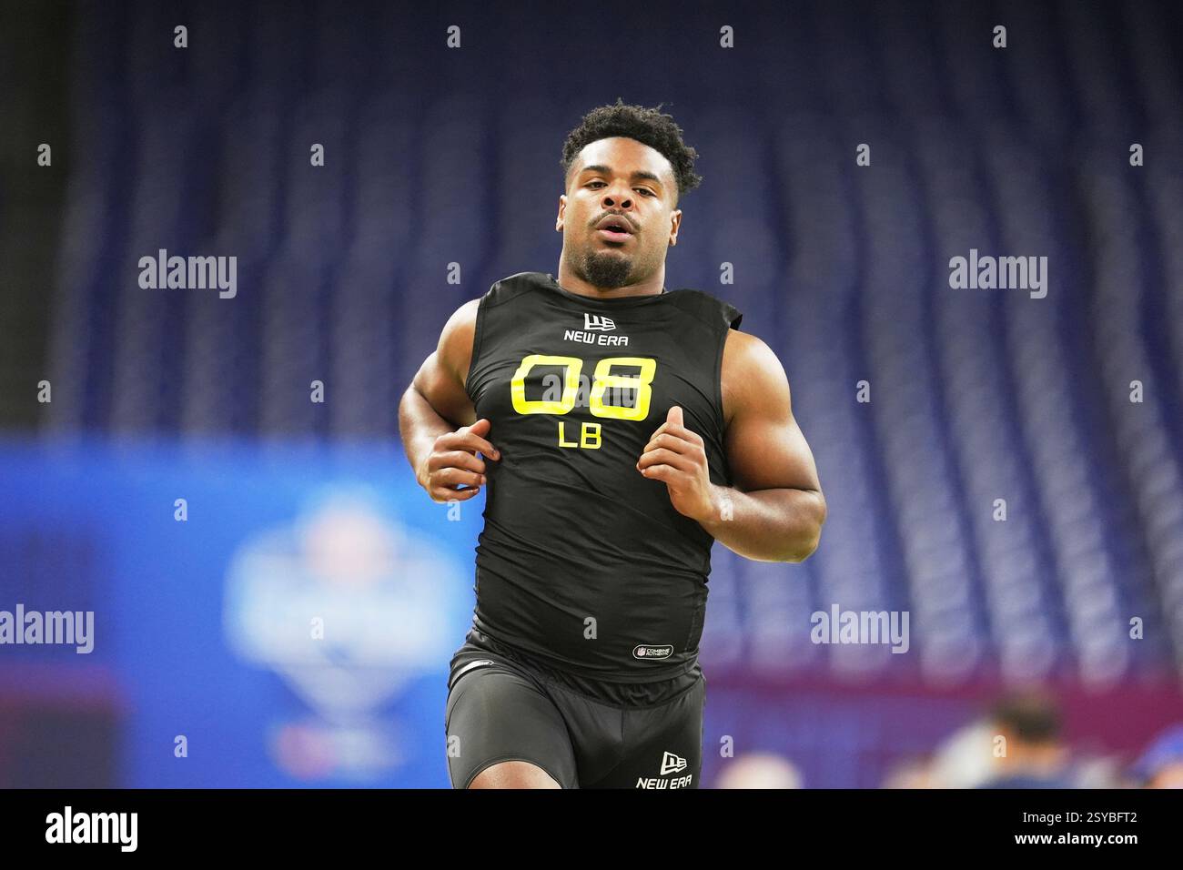 Iowa linebacker Jay Higgins runs the 40-yard dash at the NFL football ...