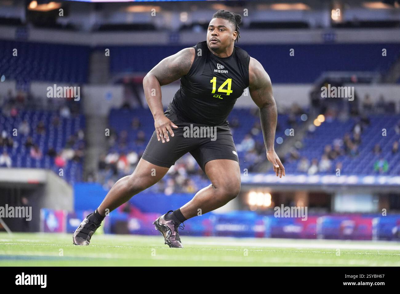 Ohio State defensive lineman Ty Hamilton runs a drill at the NFL ...