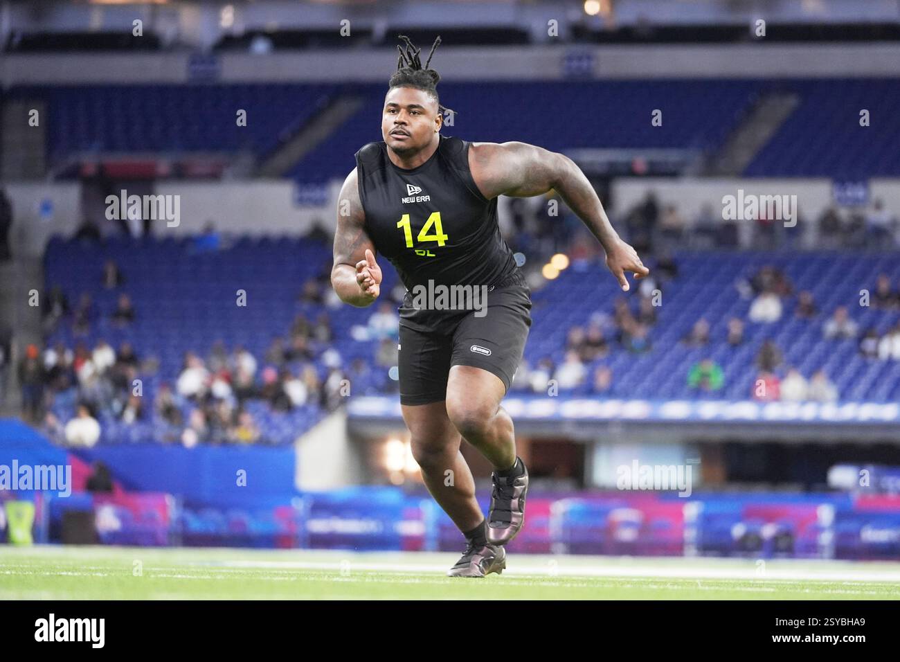 Ohio State defensive lineman Ty Hamilton runs a drill at the NFL ...