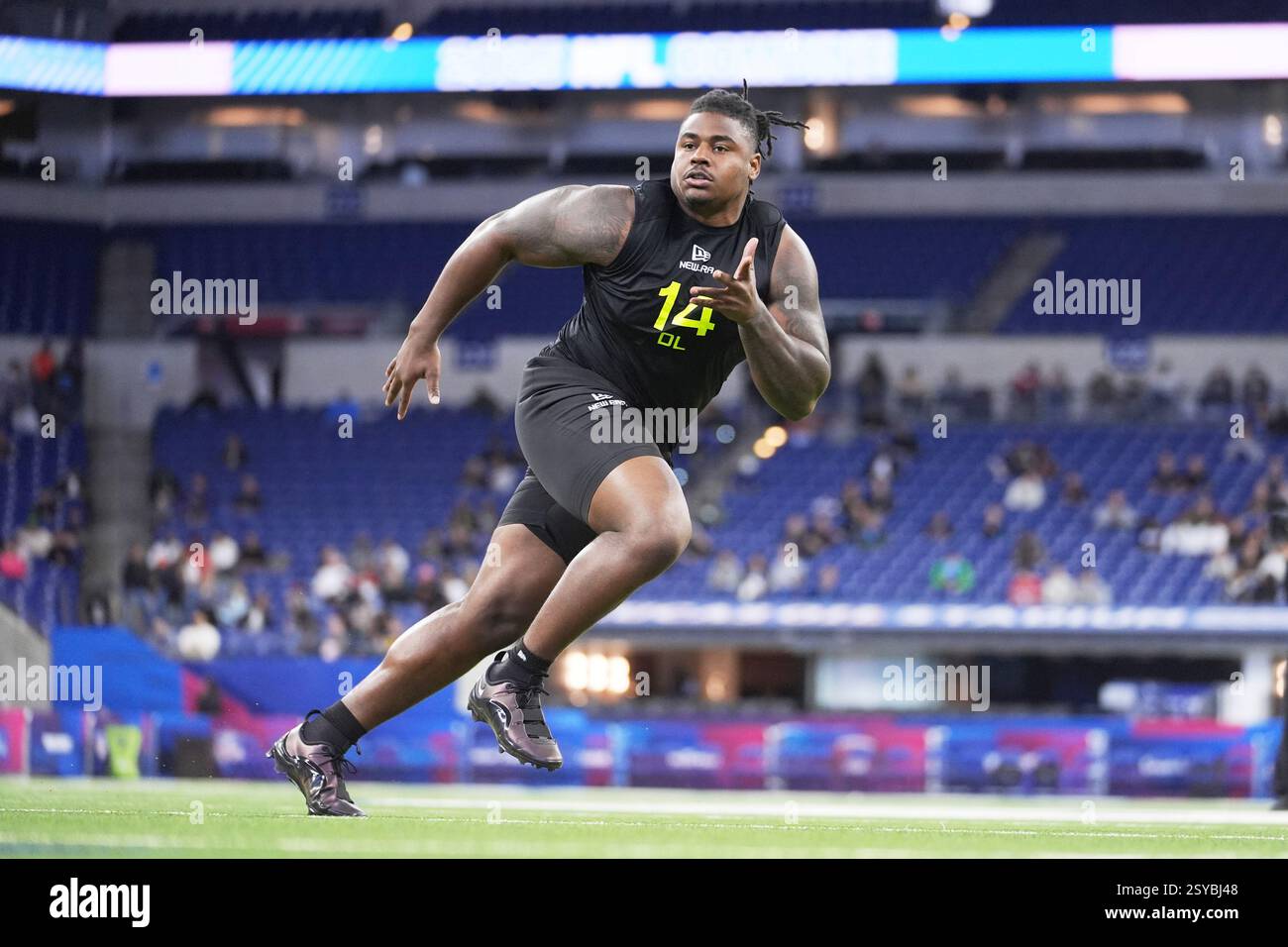 Ohio State defensive lineman Ty Hamilton runs a drill at the NFL ...