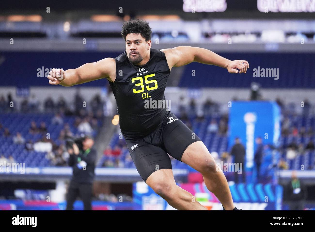 Utah defensive lineman Junior Tafuna runs a drill at the NFL football ...