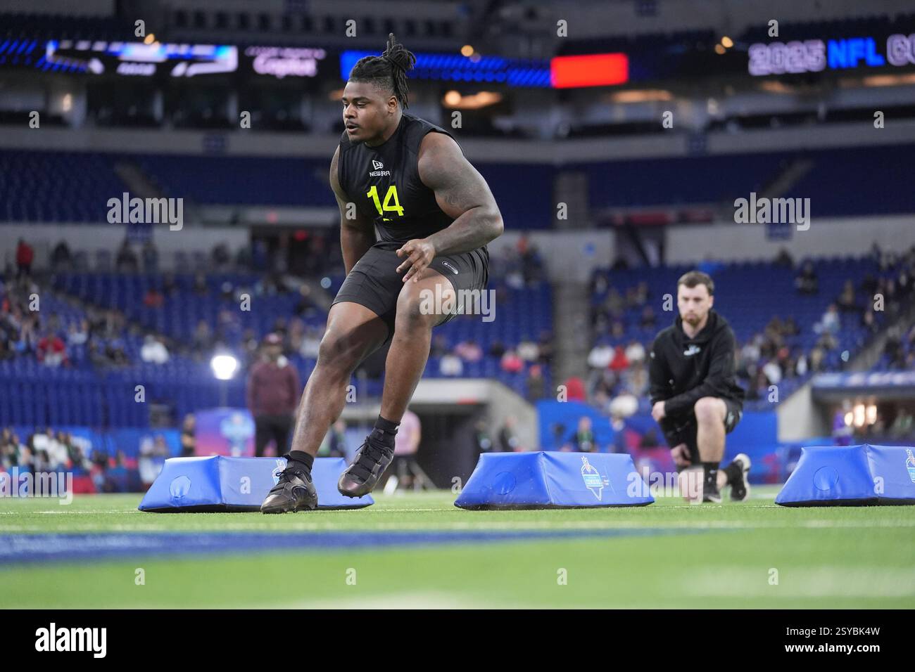 Ohio State defensive lineman Ty Hamilton runs a drill at the NFL ...