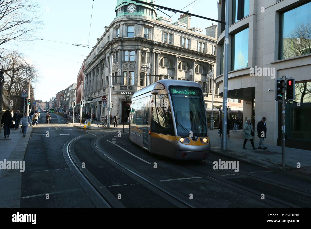 Dublin, Ireland - 26th February 2025 - A green line Luas tram turns the ...