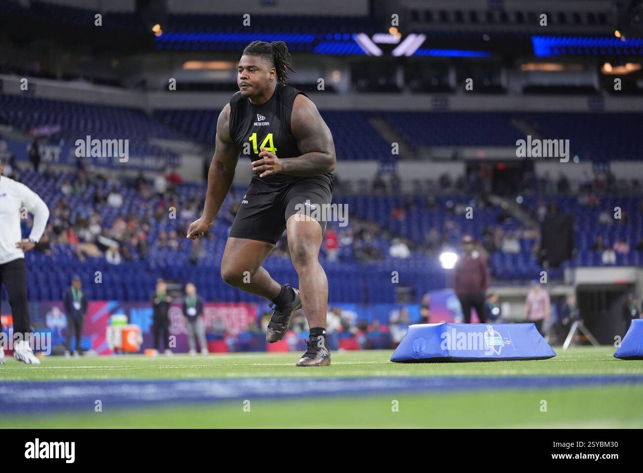 Ohio State defensive lineman Ty Hamilton runs a drill at the NFL ...