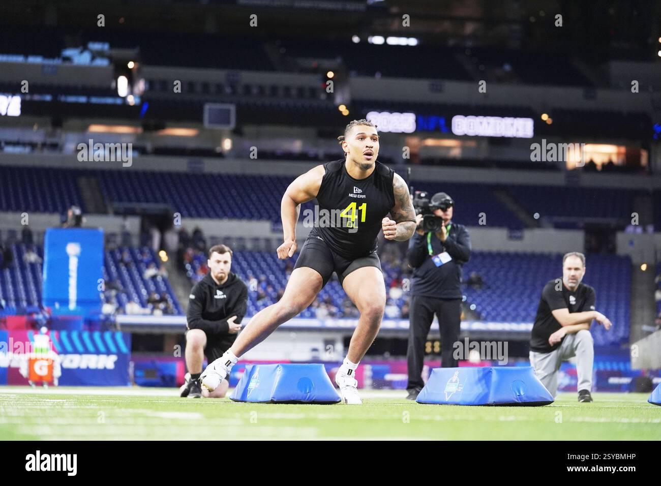Miami defensive lineman Tyler Baron runs a drill at the NFL football ...