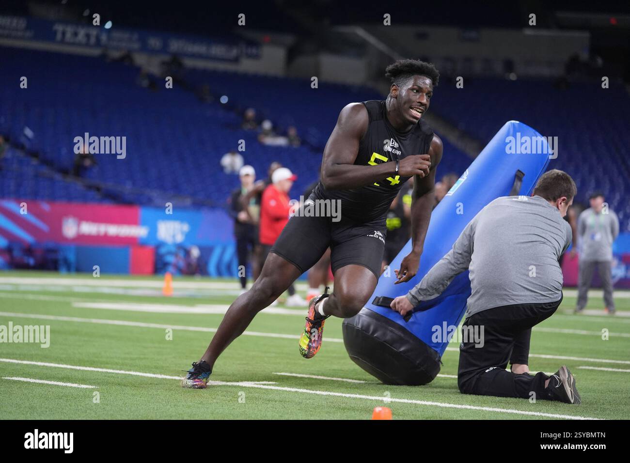 Arkansas defensive lineman Landon Jackson stretches before he runs a ...