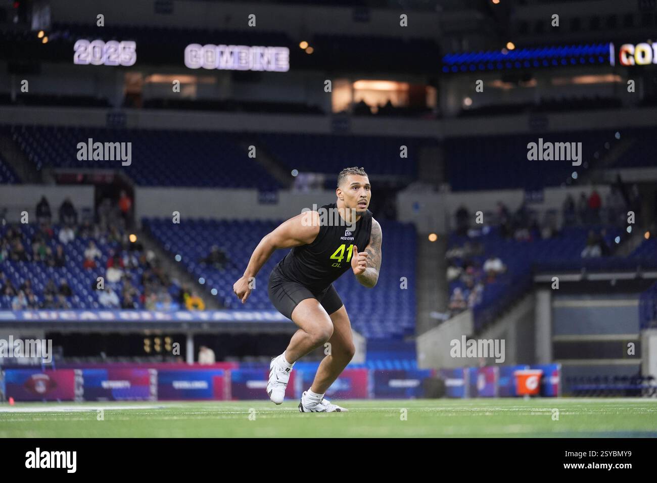 Miami defensive lineman Tyler Baron runs a drill at the NFL football ...
