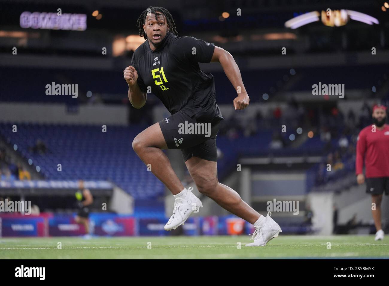 Mississippi defensive lineman Jared Ivey runs a drill at the NFL ...