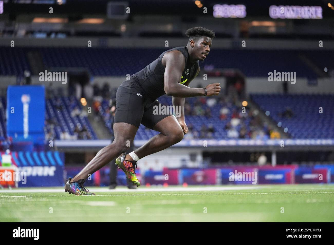 Minnesota defensive lineman Jah Joyner runs a drill at the NFL football ...