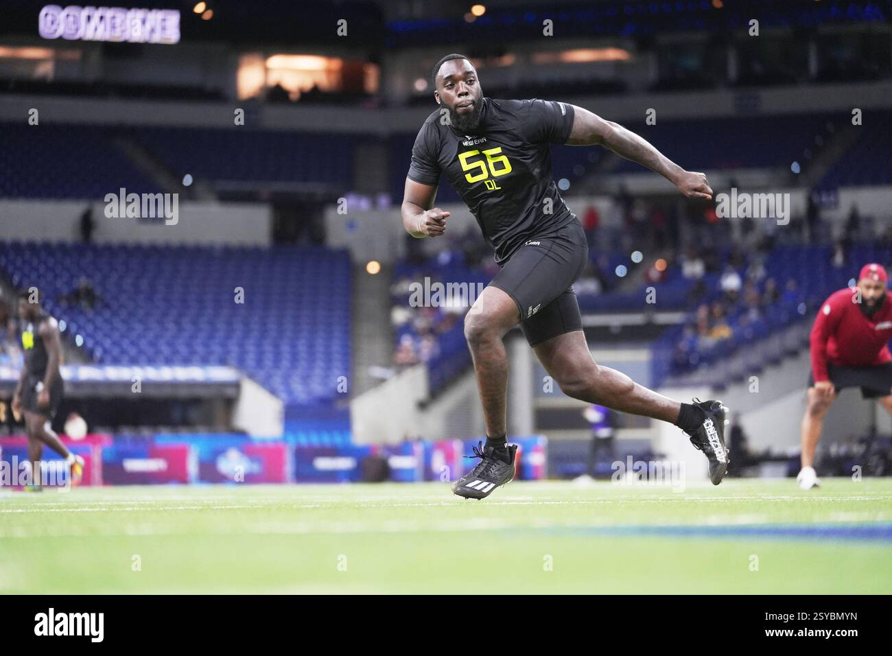 Baylor defensive lineman Steve Linton runs a drill at the NFL football scouting combine in ...