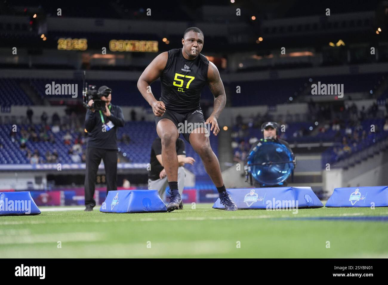 West Virginia defensive lineman Sean Martin runs a drill at the NFL ...