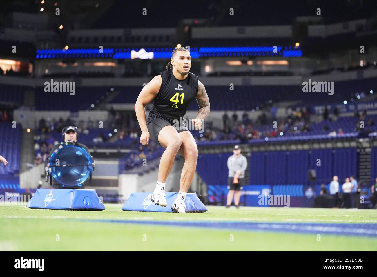 Miami defensive lineman Tyler Baron runs a drill at the NFL football ...
