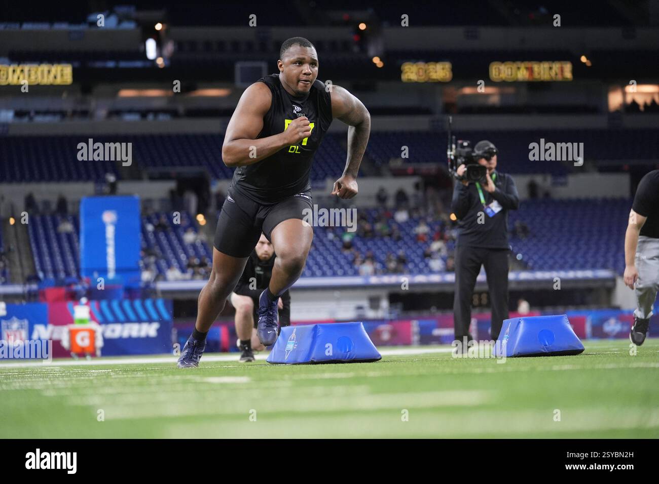 West Virginia defensive lineman Sean Martin runs a drill at the NFL ...