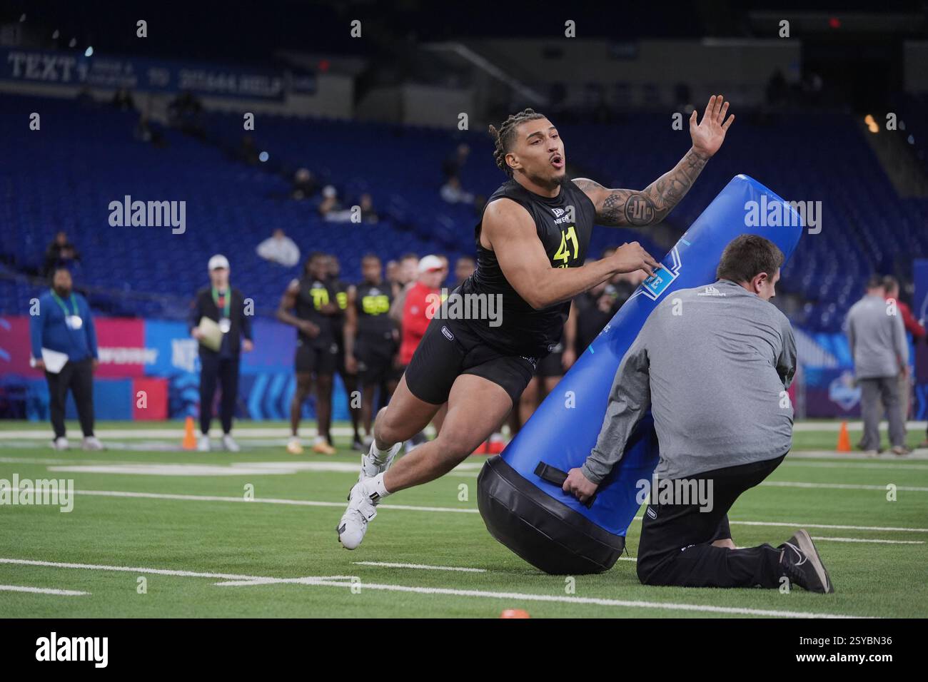 Arkansas defensive lineman Landon Jackson stretches before he runs a ...