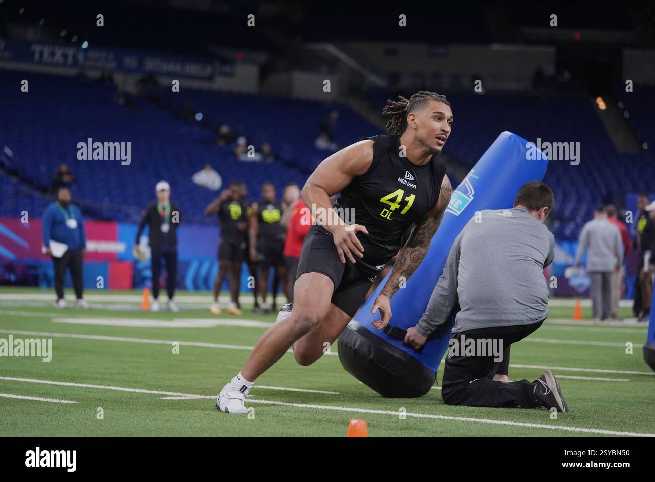 Arkansas defensive lineman Landon Jackson stretches before he runs a ...