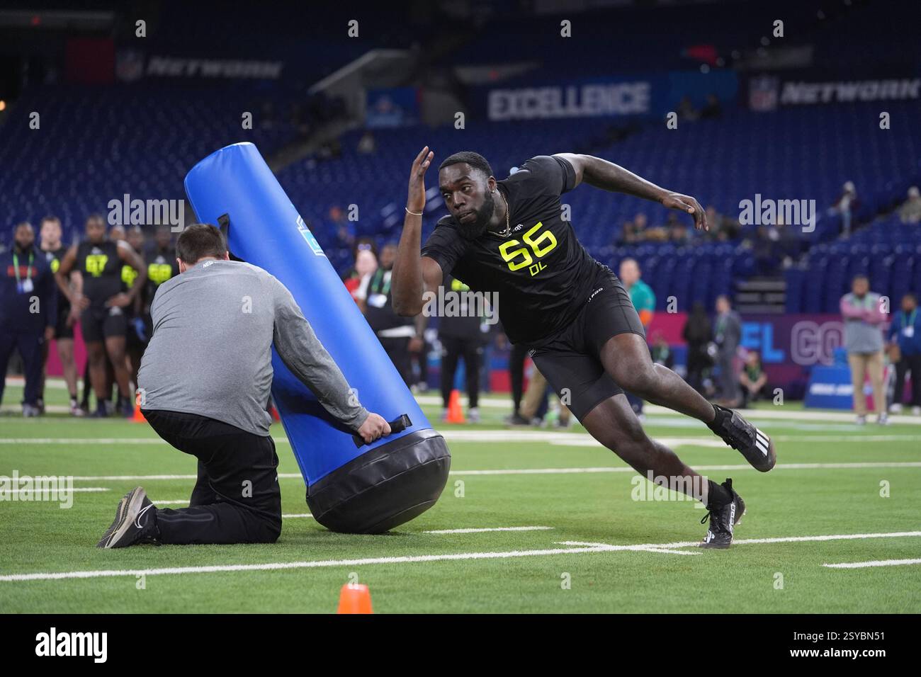 Baylor defensive lineman Steve Linton runs a drill at the NFL football scouting combine in ...