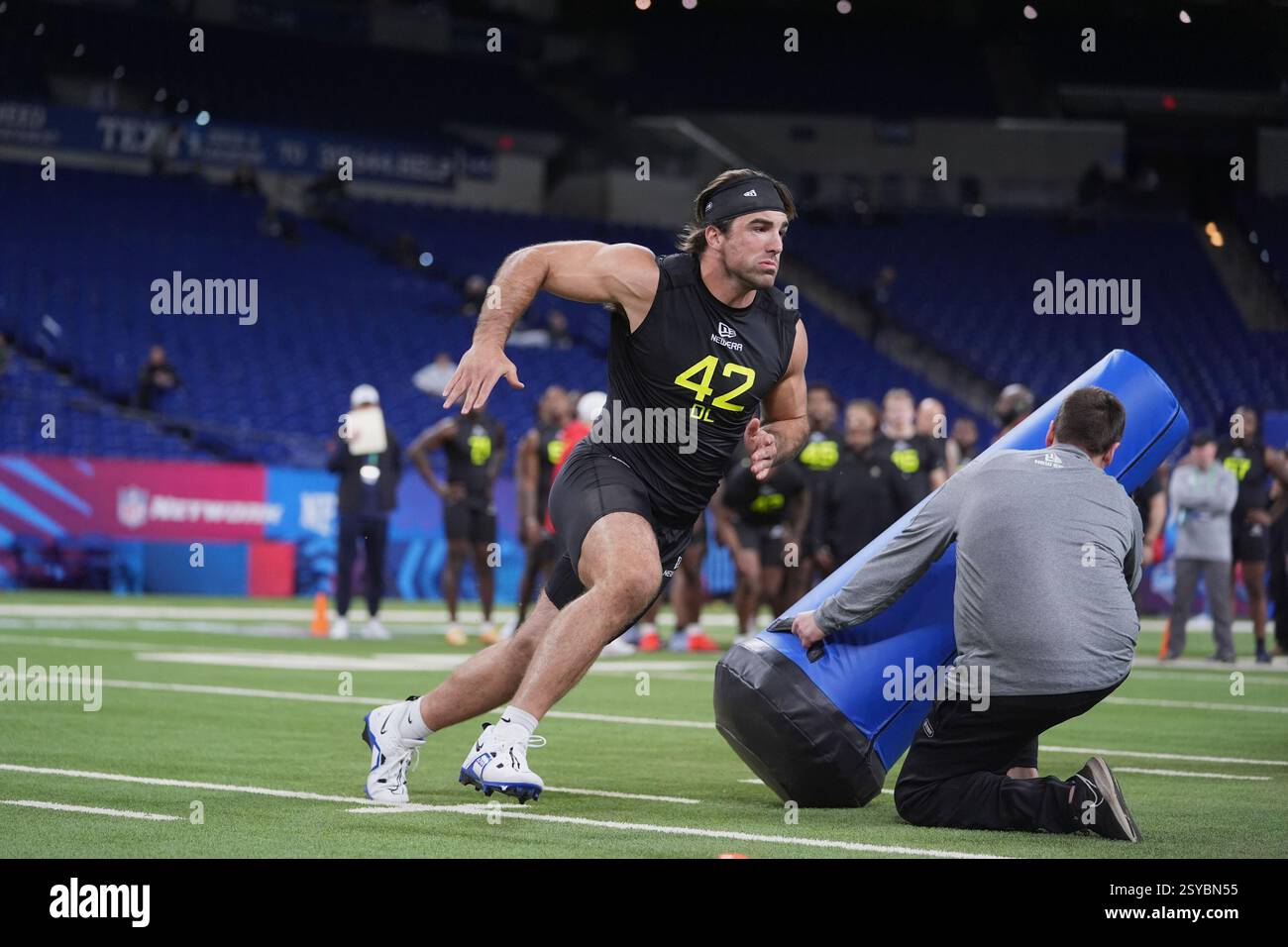 Arkansas defensive lineman Landon Jackson stretches before he runs a ...