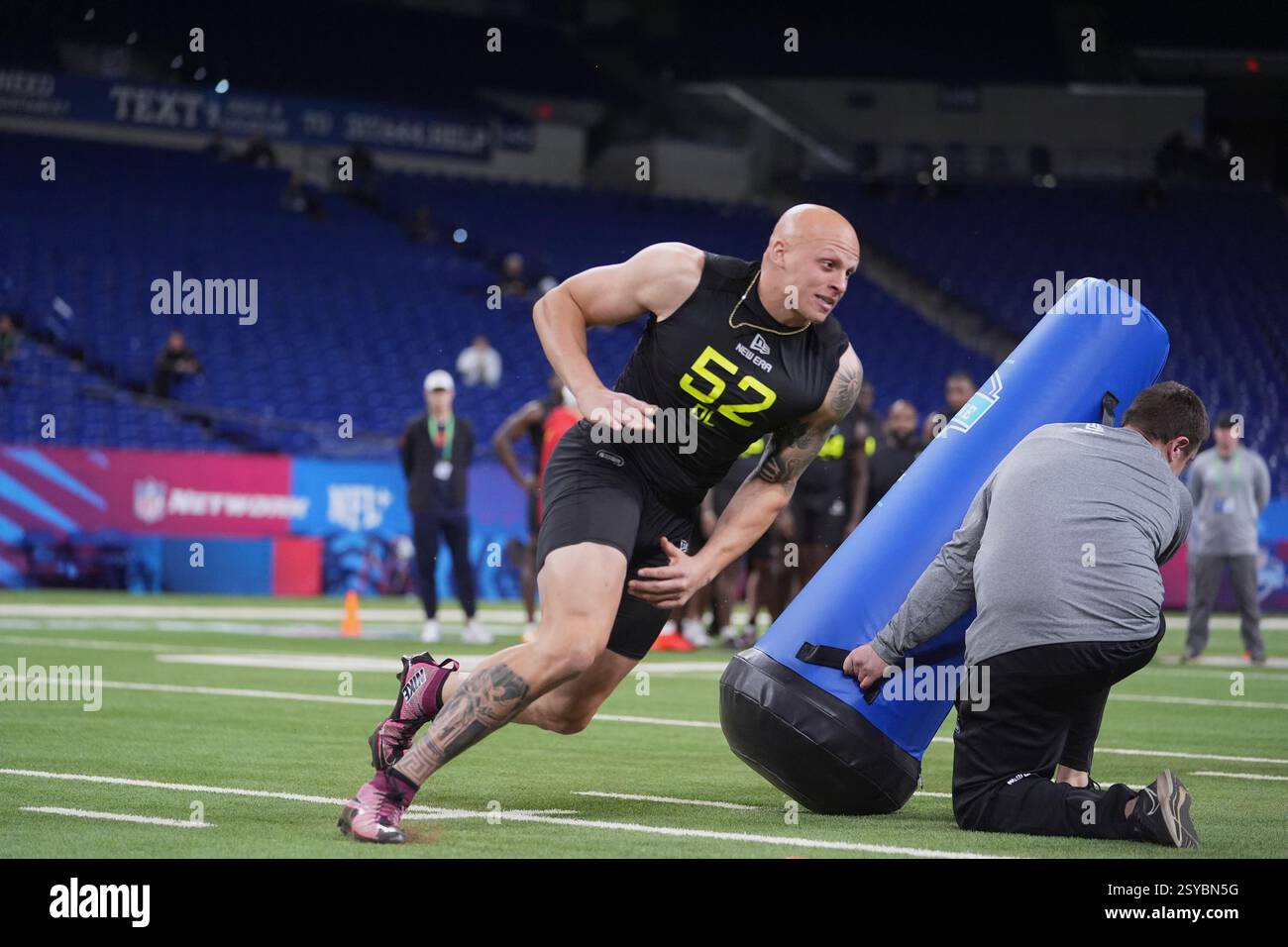 Arkansas defensive lineman Landon Jackson stretches before he runs a ...