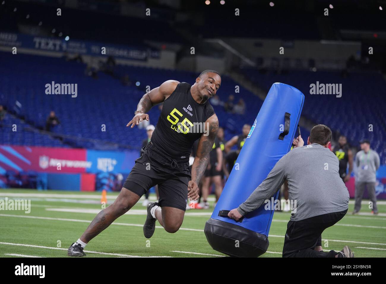 Arkansas defensive lineman Landon Jackson stretches before he runs a ...