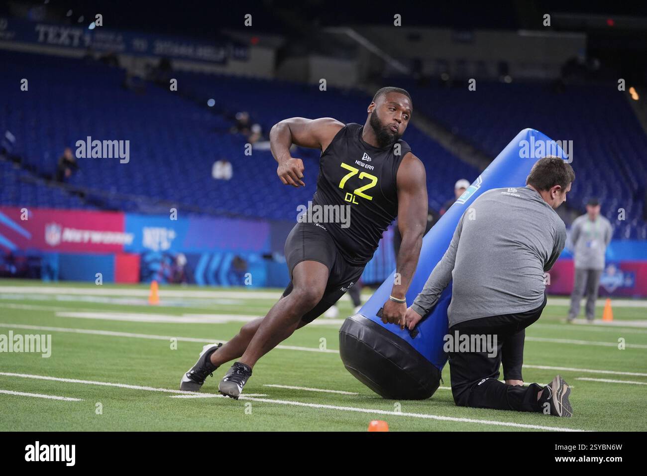 Arkansas defensive lineman Landon Jackson stretches before he runs a ...