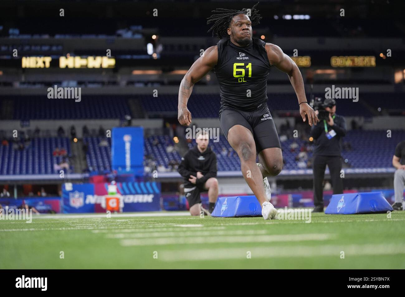 SMU defensive lineman Elijah Roberts runs a drill at the NFL football ...