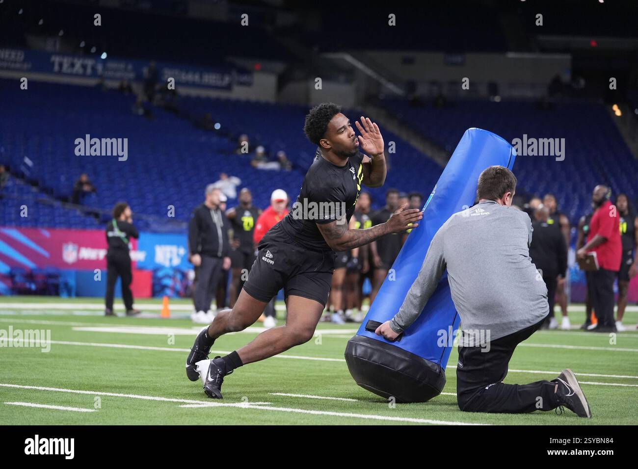 Arkansas defensive lineman Landon Jackson stretches before he runs a ...