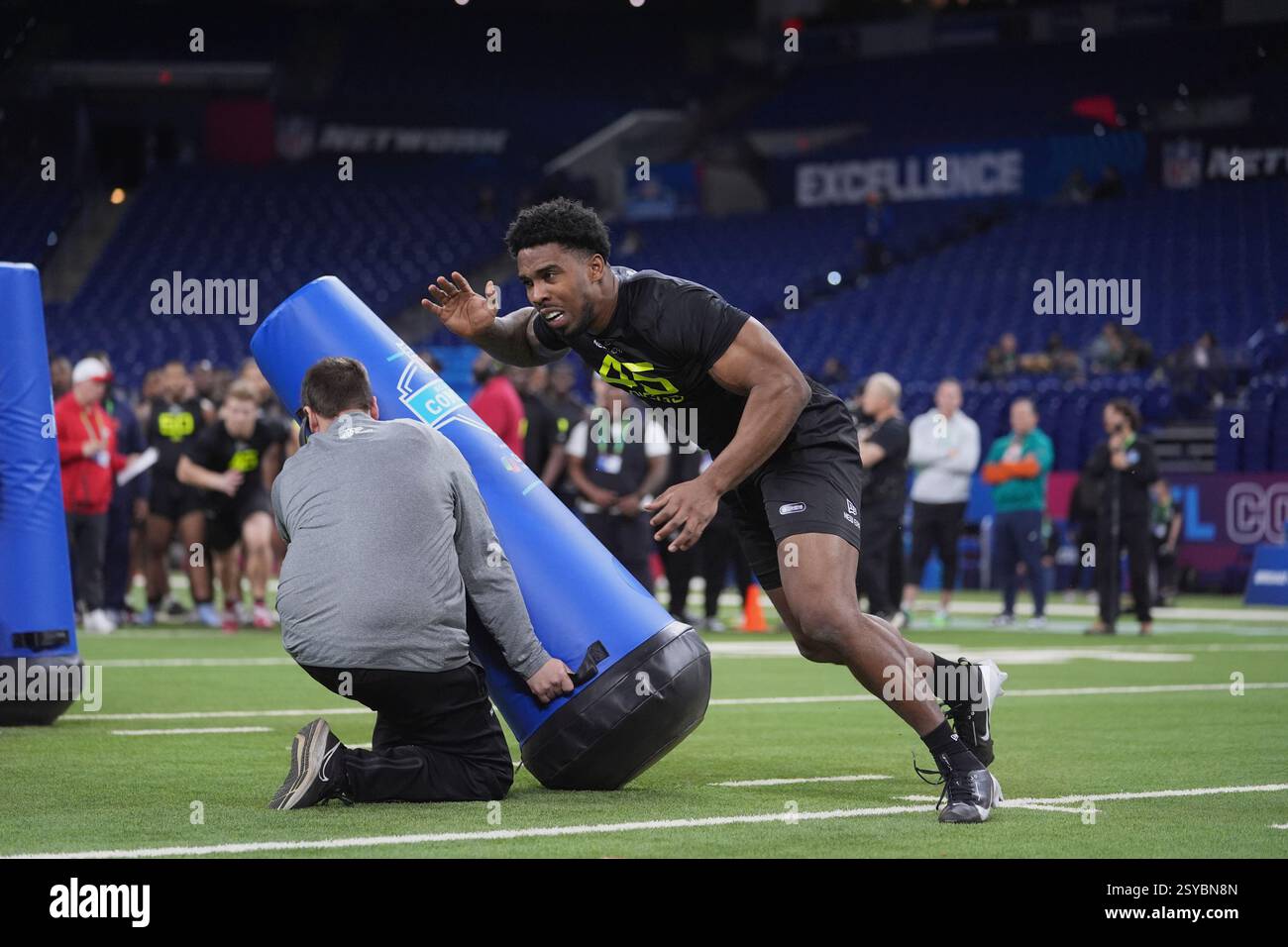 Syracuse defensive lineman Fadil Diggs runs a drill at the NFL football ...