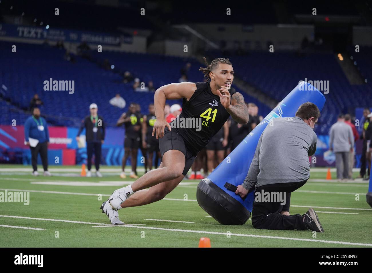 Arkansas defensive lineman Landon Jackson stretches before he runs a ...