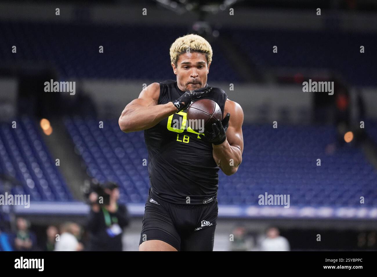 California linebacker Teddye Buchanan runs a drill at the NFL football ...