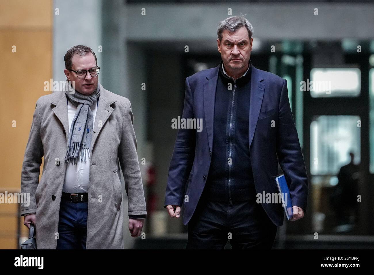 28 February 2025, Berlin: Markus Söder (r), CSU Chairman and Minister ...