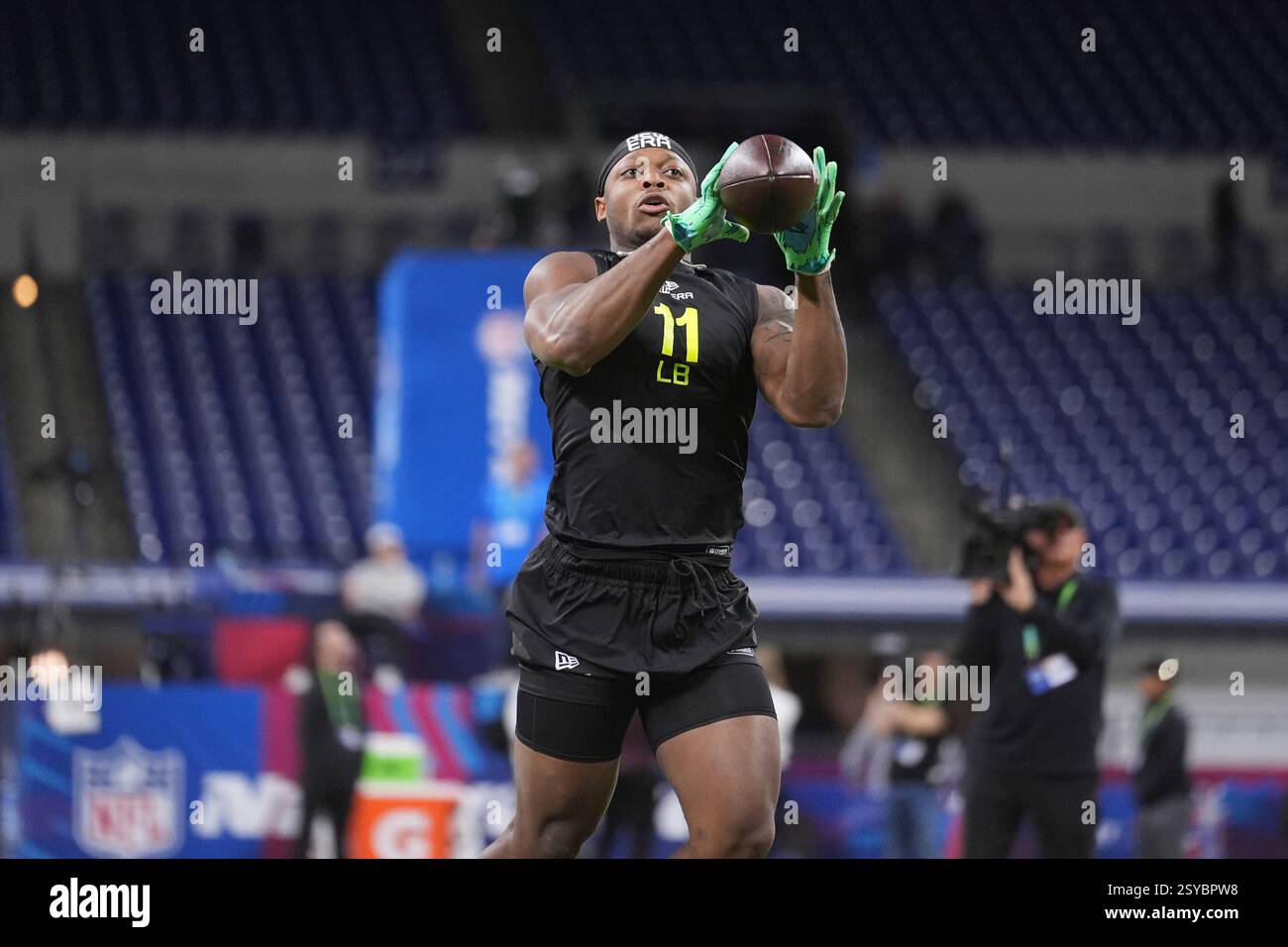 Penn State linebacker Kobe King runs a drill at the NFL football ...